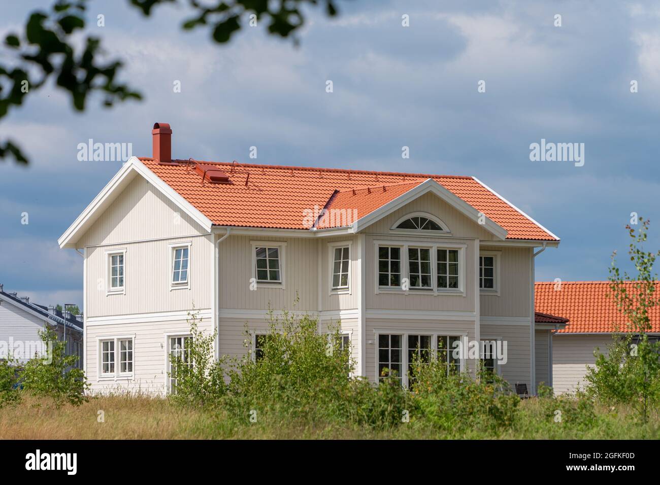 Beautiful luxury residence house home with red roof Stock Photo - Alamy