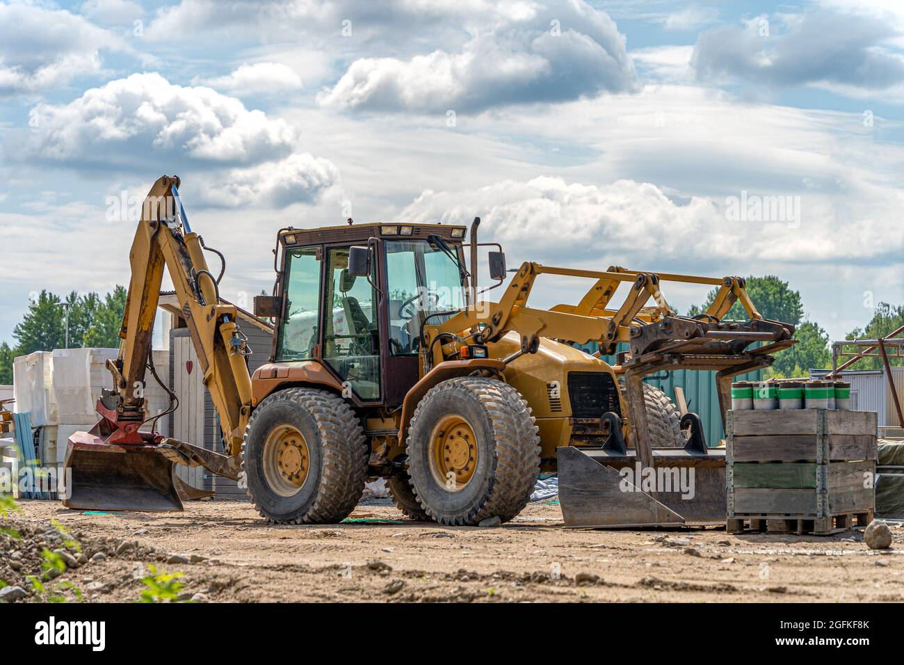 Image of building machines on the house construction site Stock Photo ...