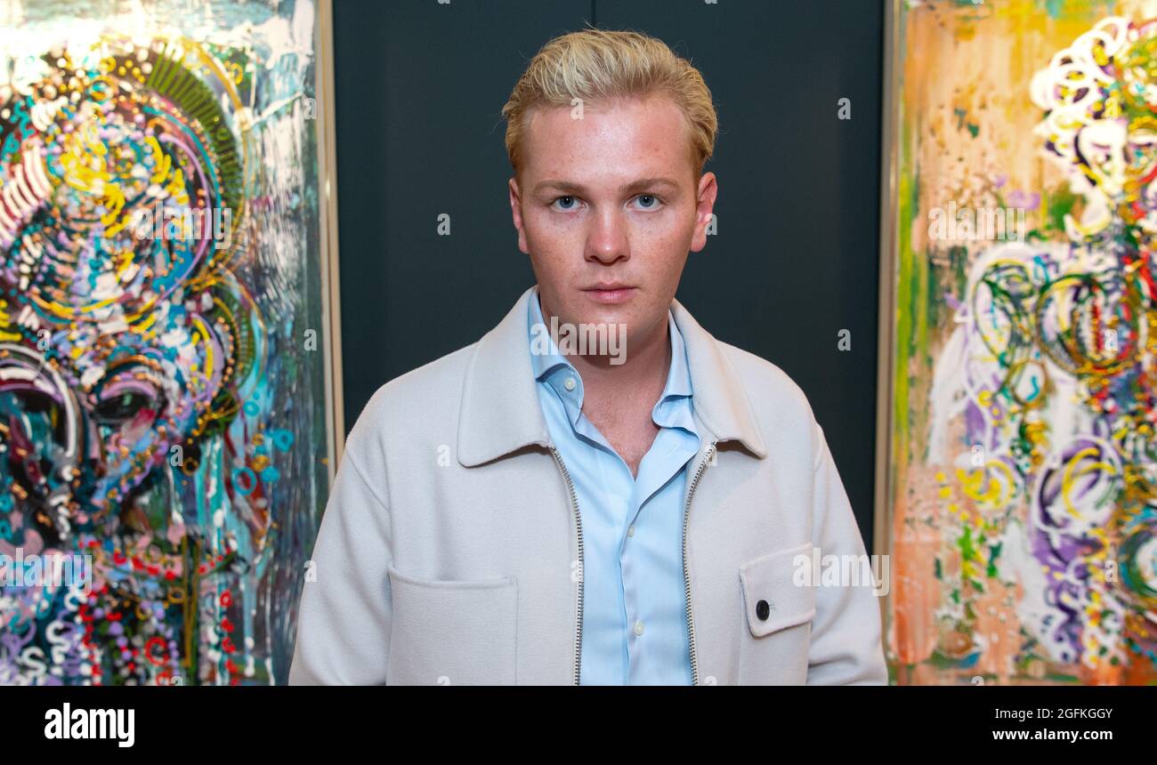 Munich, Germany. 26th Aug, 2021. The artist Leon Löwentraut stands at a ...