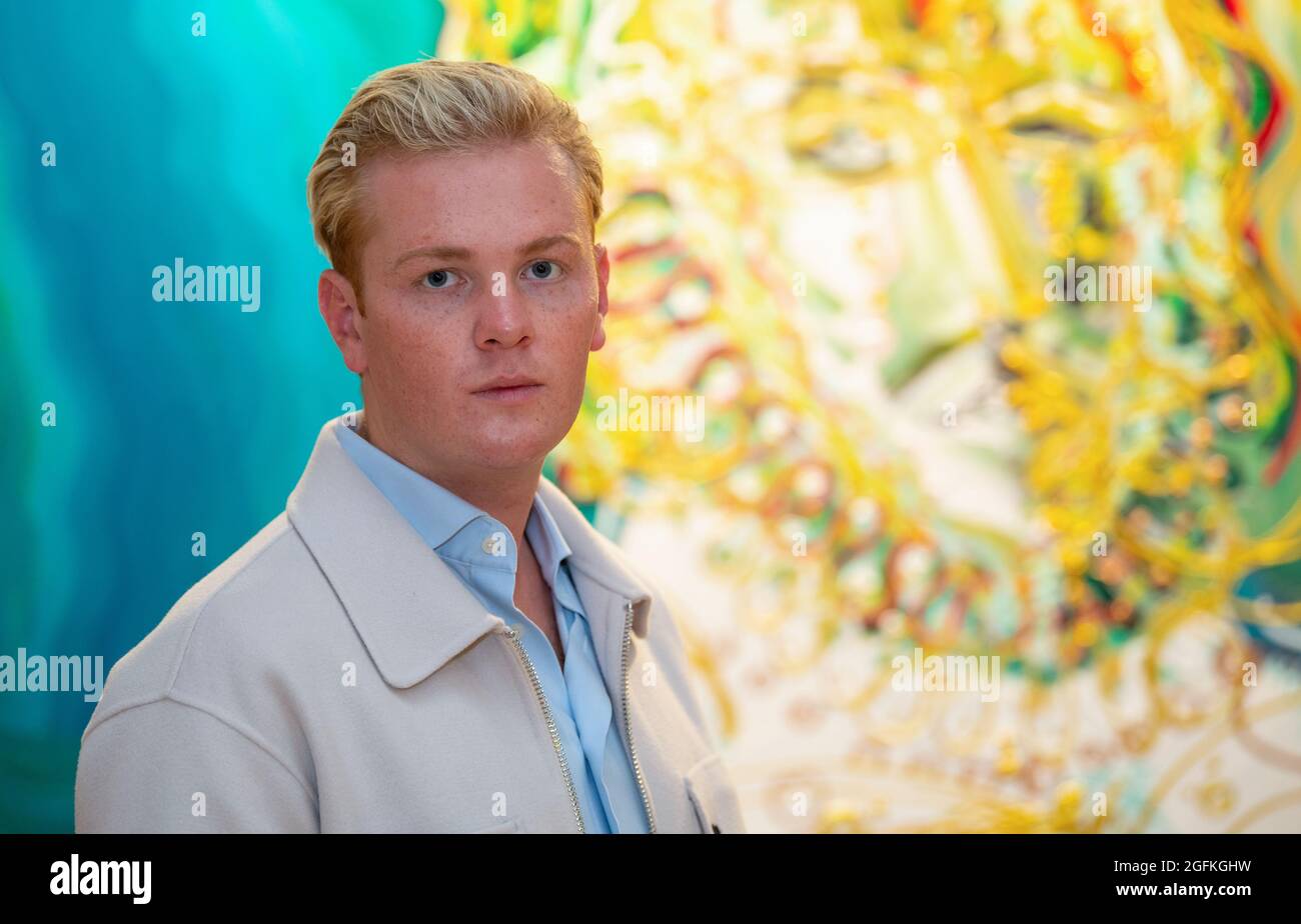Munich, Germany. 26th Aug, 2021. The artist Leon Löwentraut stands at a ...