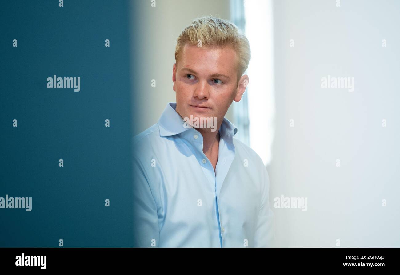 Munich, Germany. 26th Aug, 2021. The artist Leon Löwentraut stands at a ...