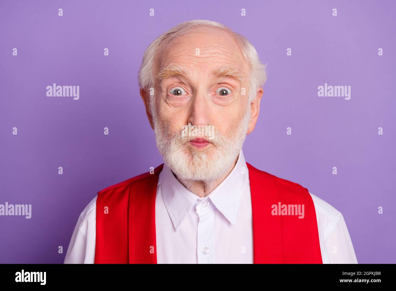 Photo of positive old funky man make funny face good mood wear red vest ...