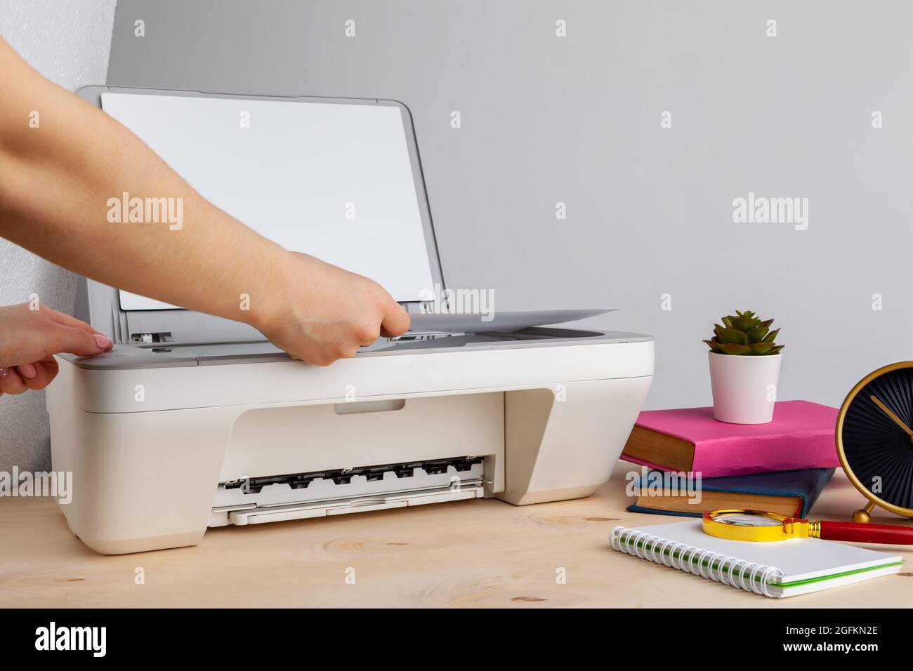 Woman printer cartridge hi-res stock photography and images - Alamy