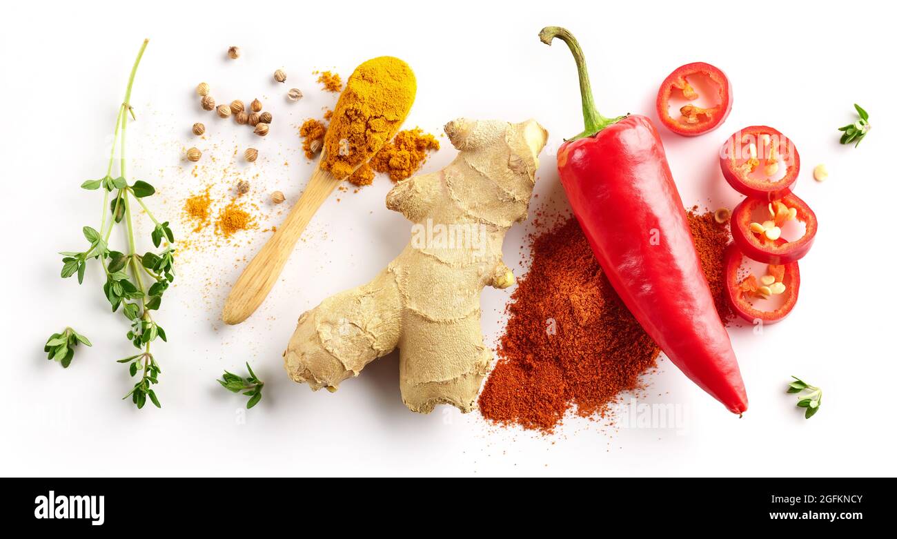 Set of spices - thyme, curry powder, red bell pepper, ginger root ...