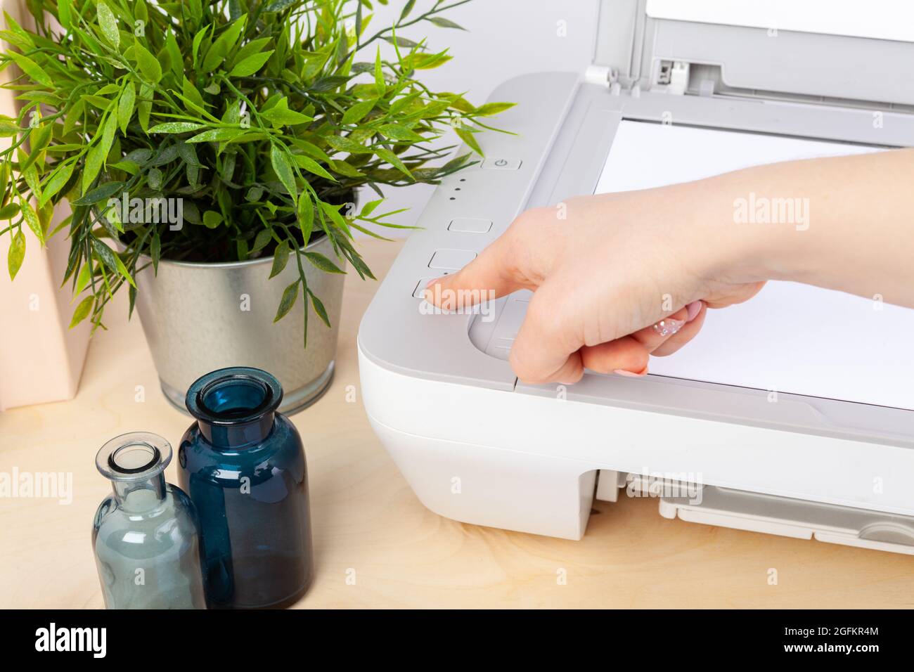 Close up woman using photocopier hi-res stock photography and images ...