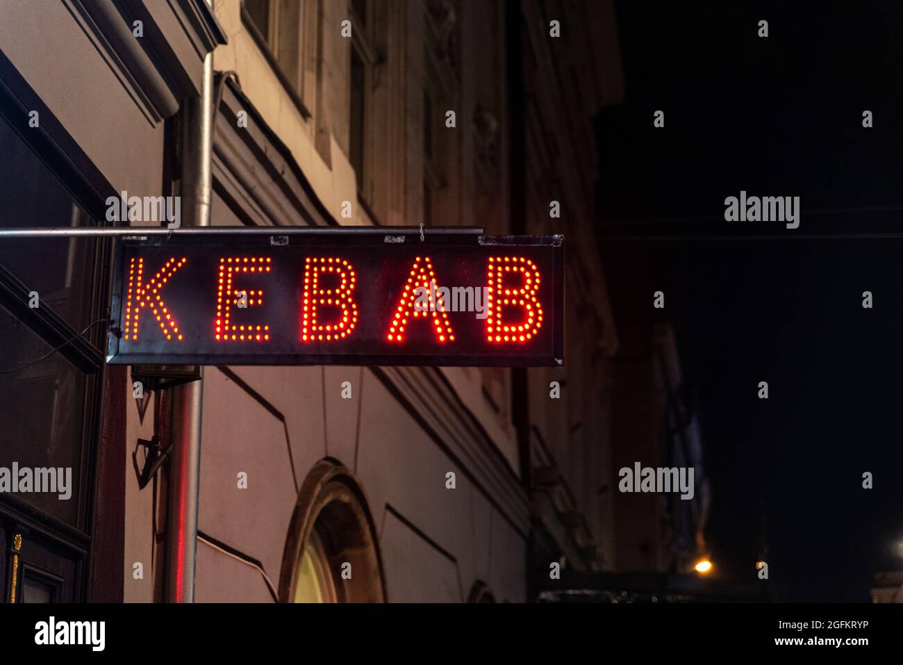 Illuminated red sign of a kebab at night in Krakow, Poland Stock Photo ...