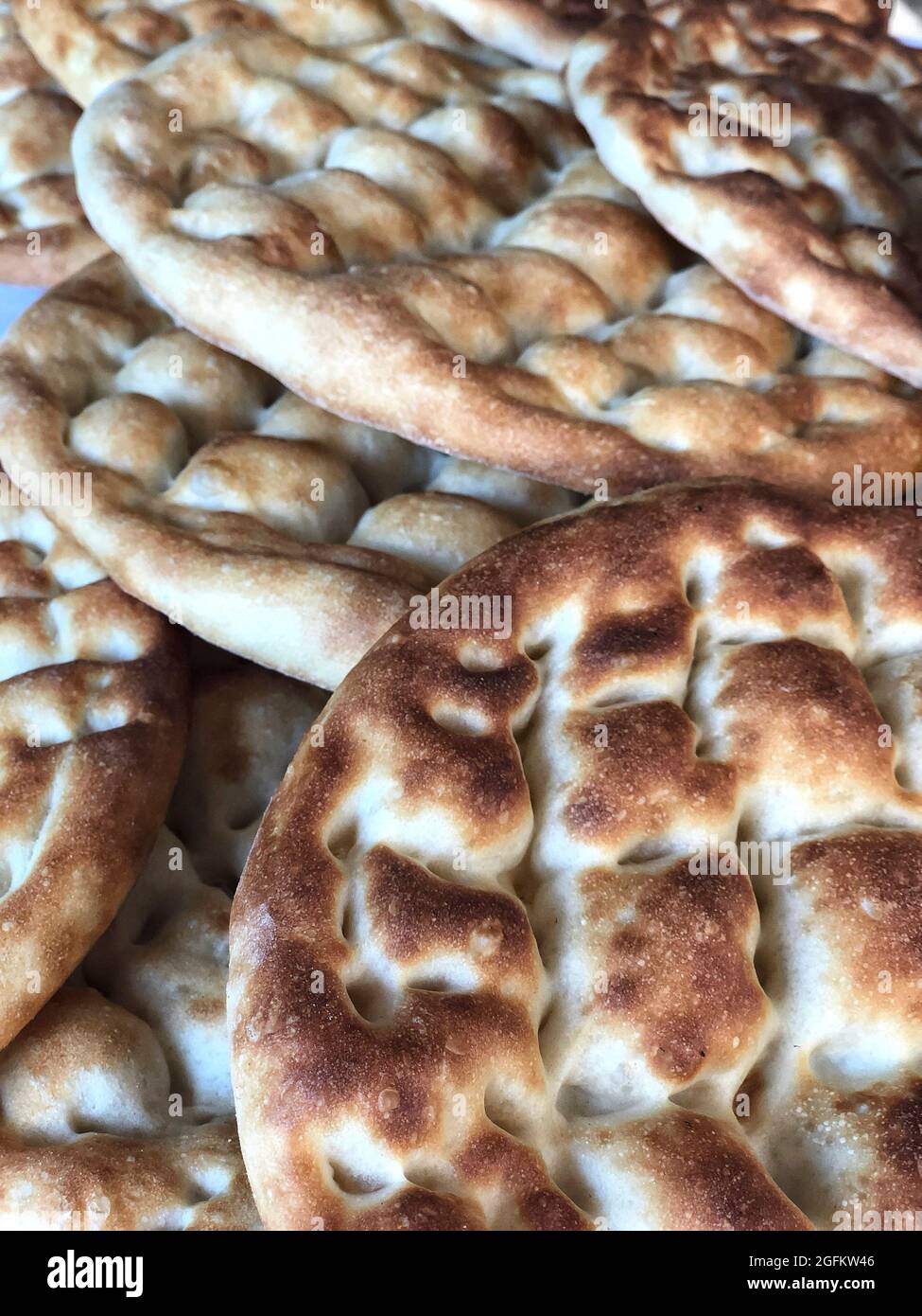 closeup pile of pita bread for ramadan, as a background Stock Photo - Alamy