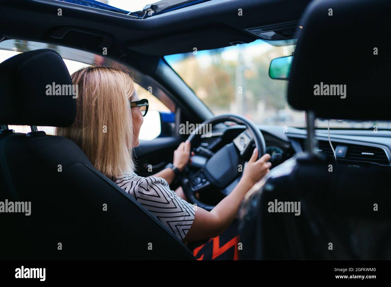 Car girl back seat rear view hi-res stock photography and images - Alamy