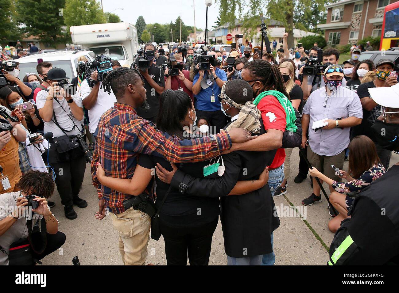 Justin Blake, right, uncle of Jacob Blake, gathers with community ...