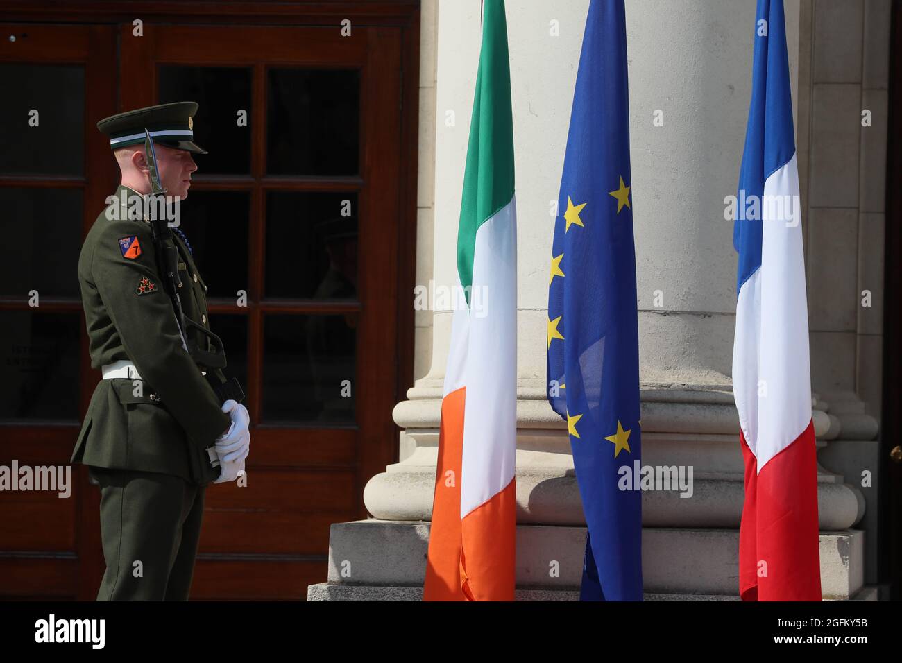 A member of the Irish Defence Force before French President Emmanuel ...
