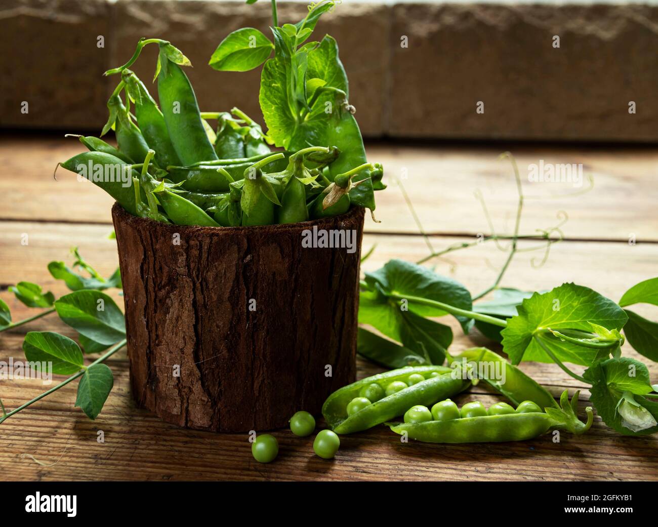 Fresh green peas pods and green peas with sprouts. Healthy eating Stock ...