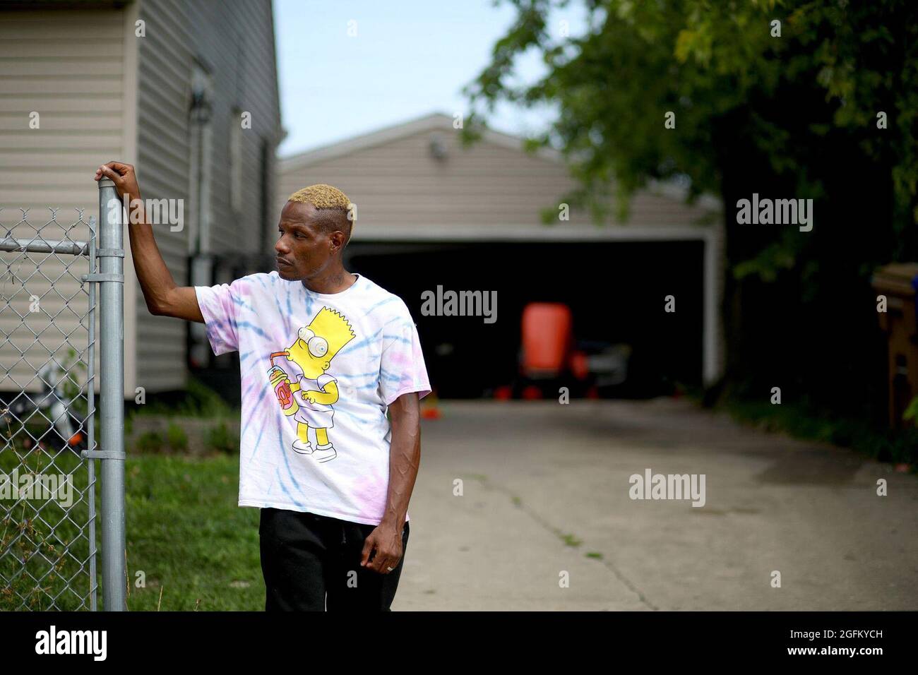 Walter McMorris, 49, outside his Kenosha home on Aug. 19, 2021 ...