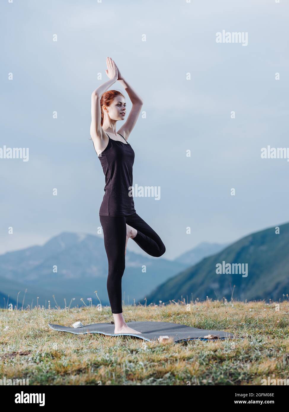 athletic woman chords fresh air exercise freedom Stock Photo - Alamy