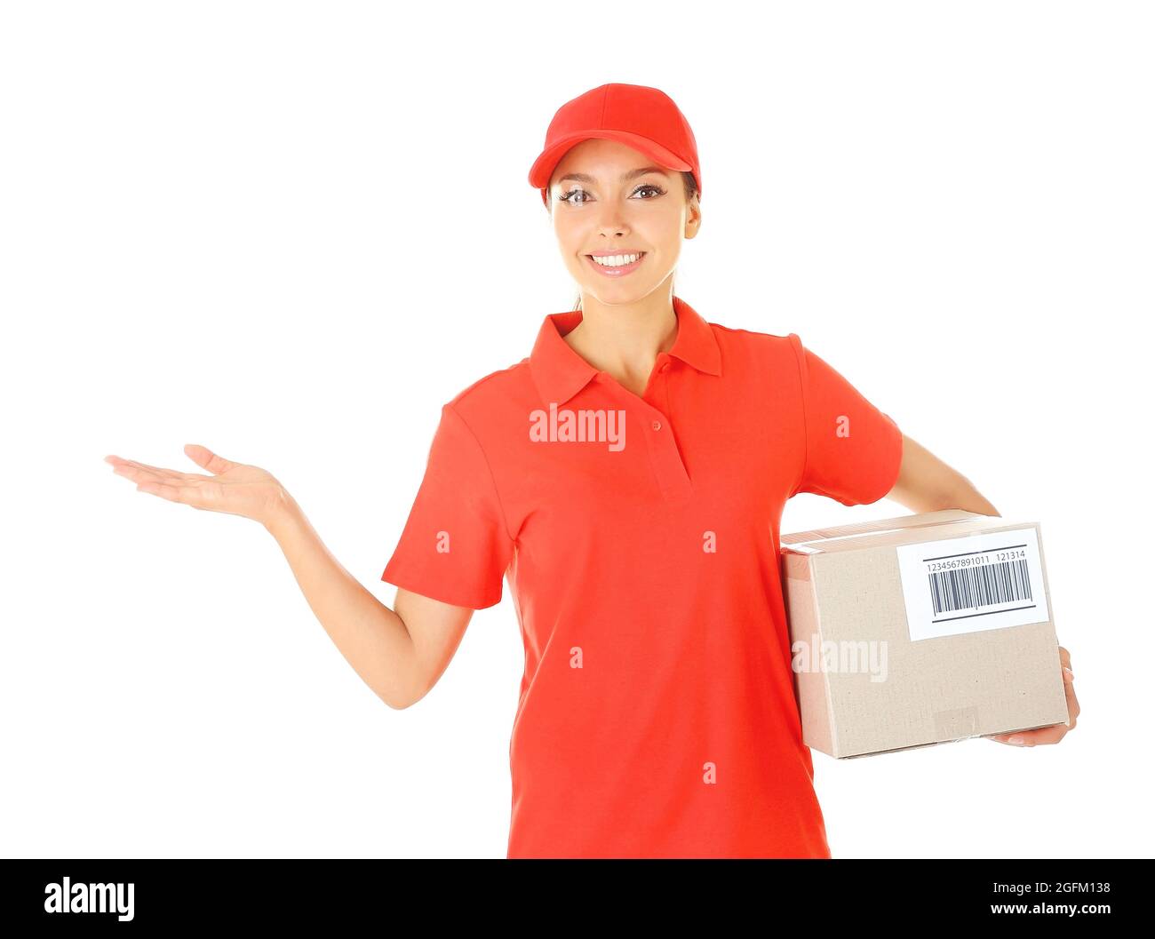 Delivery woman in uniform with parcel on white background Stock Photo ...