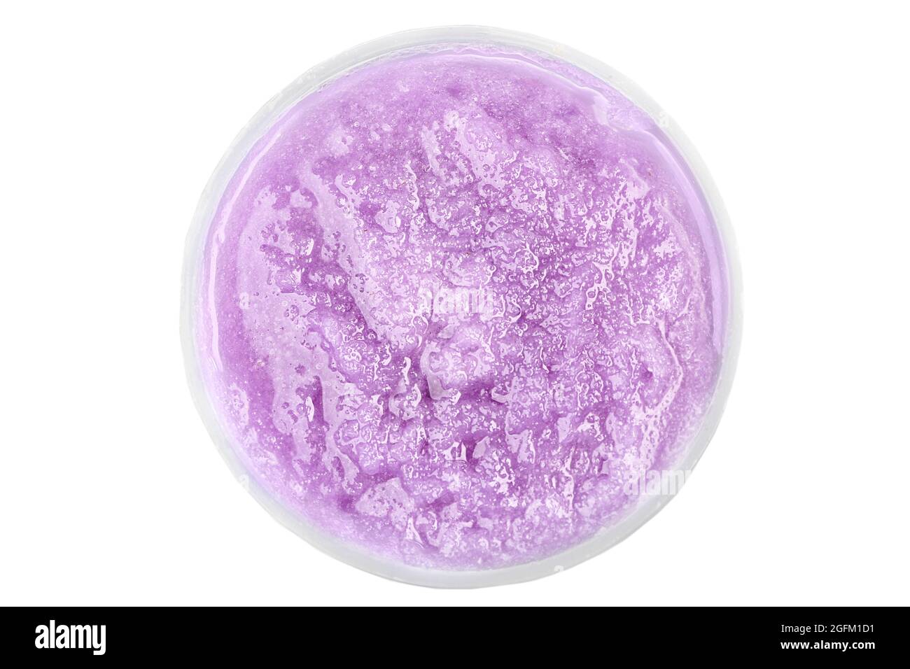 Natural scrub in container on white background Stock Photo - Alamy