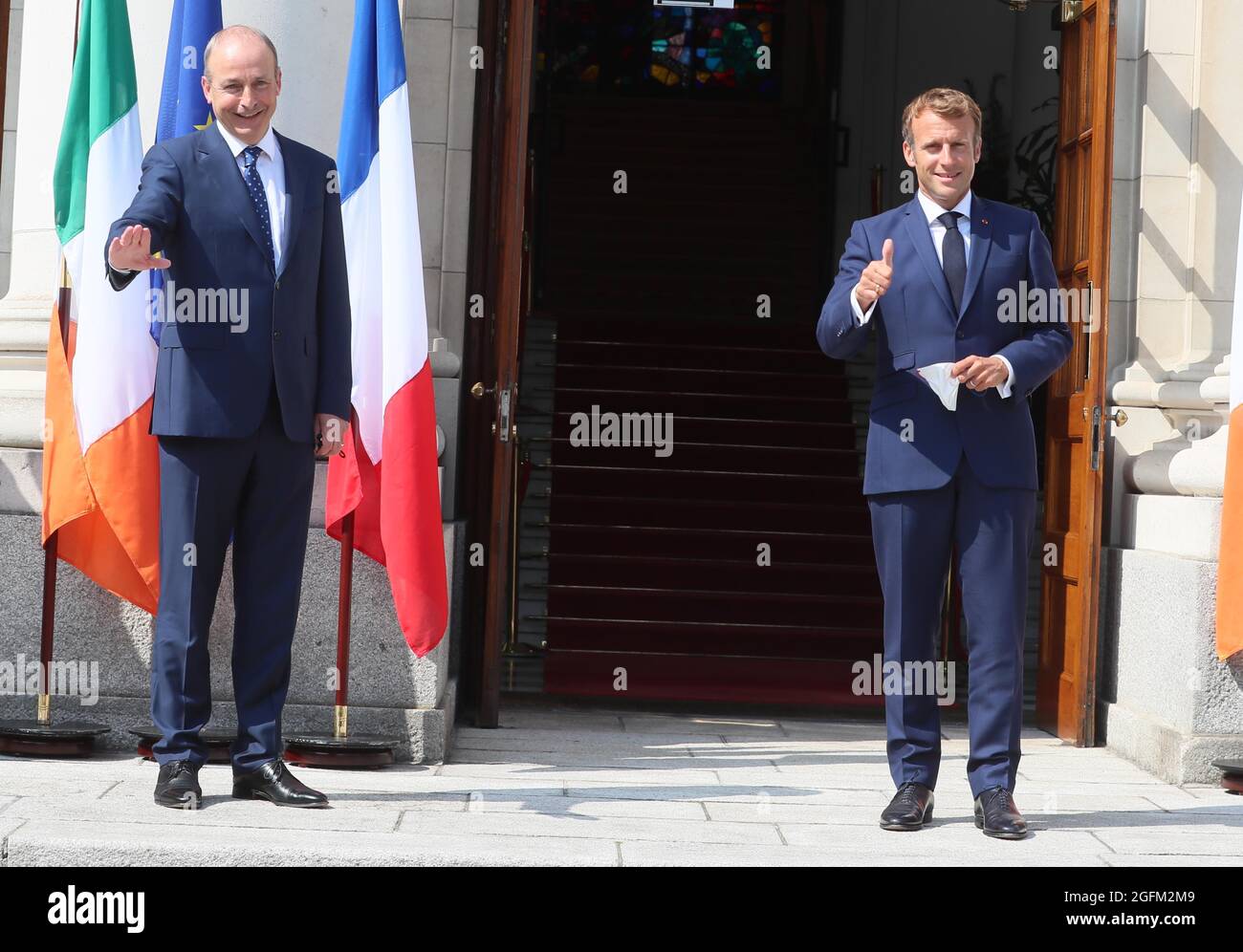 Taoiseach Micheal Martin (left) meets French President Emmanuel Macron ...