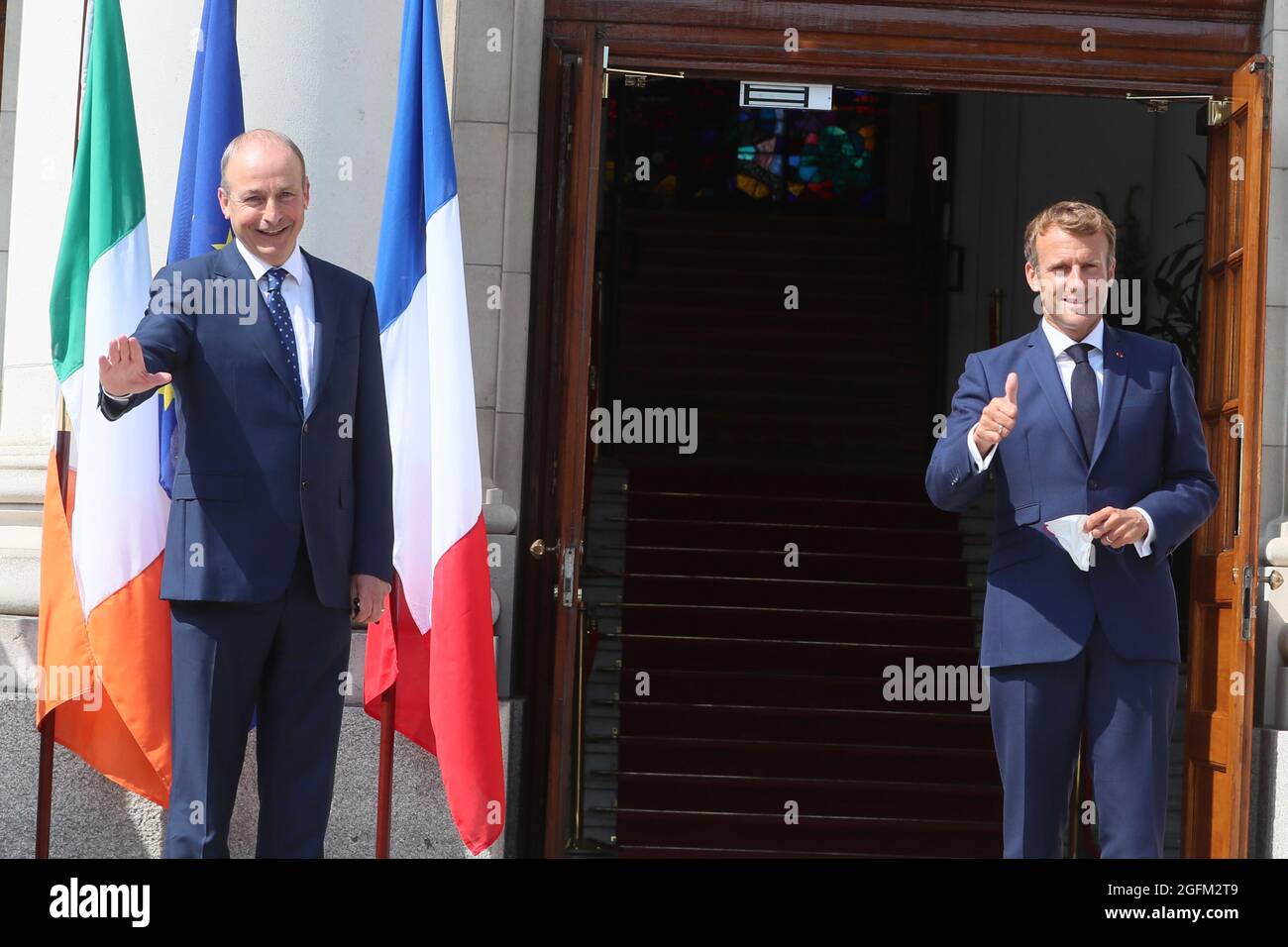 Taoiseach Micheal Martin (left) meets French President Emmanuel Macron ...