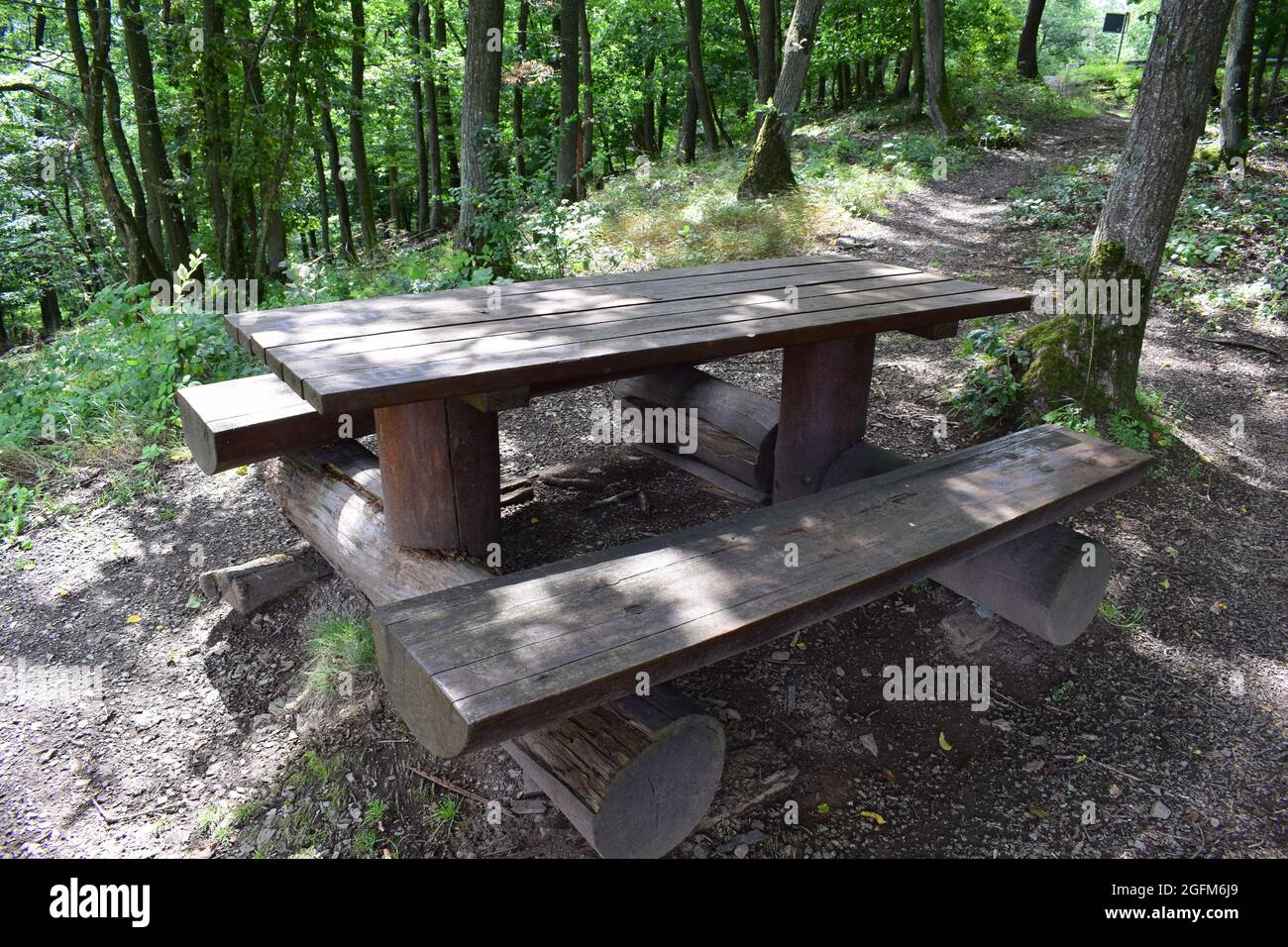 resting area with table and park bench Stock Photo - Alamy