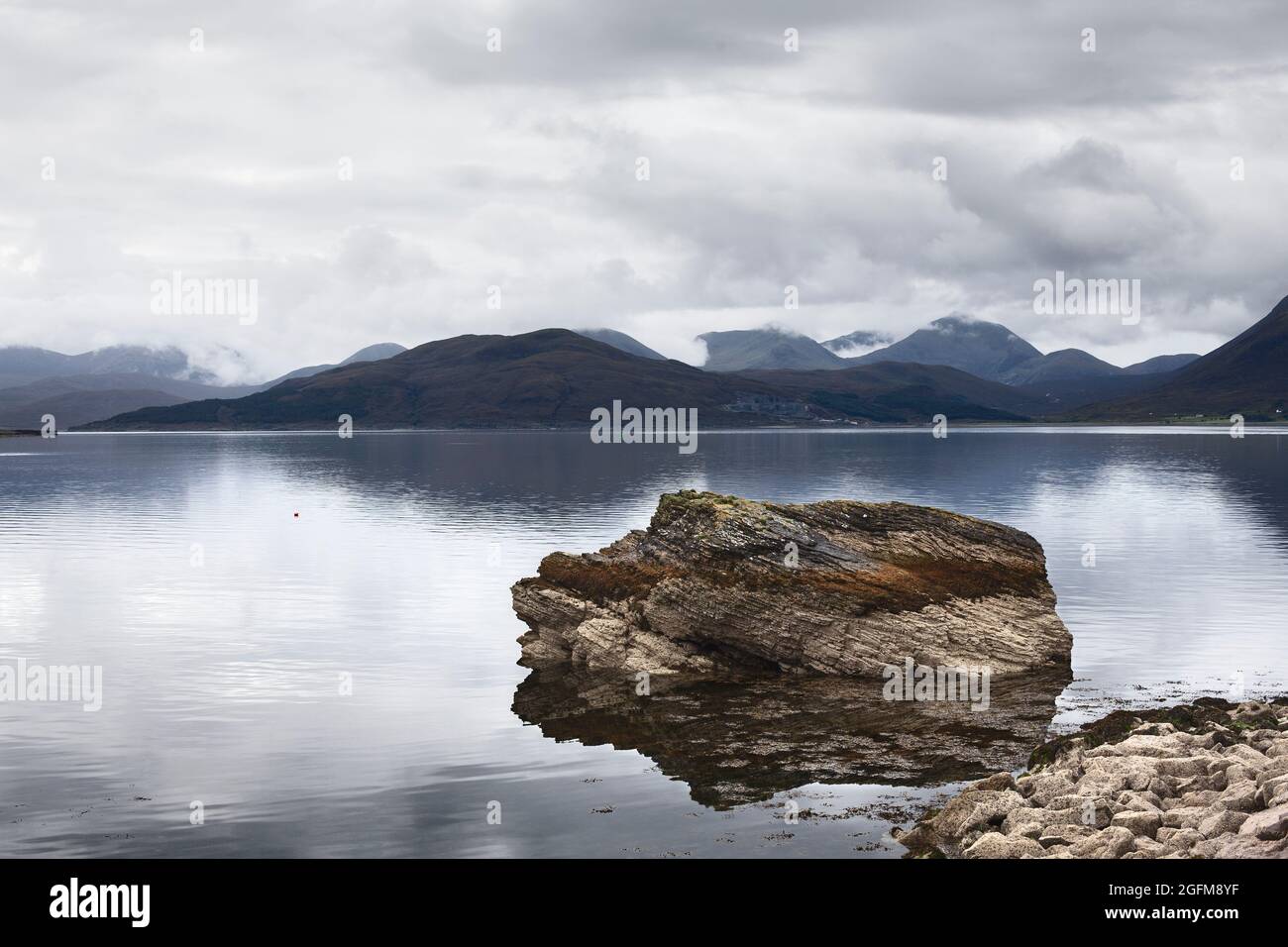 Rocks at sea on a cloudy day, Isle of Raasay, Scotland Stock Photo - Alamy