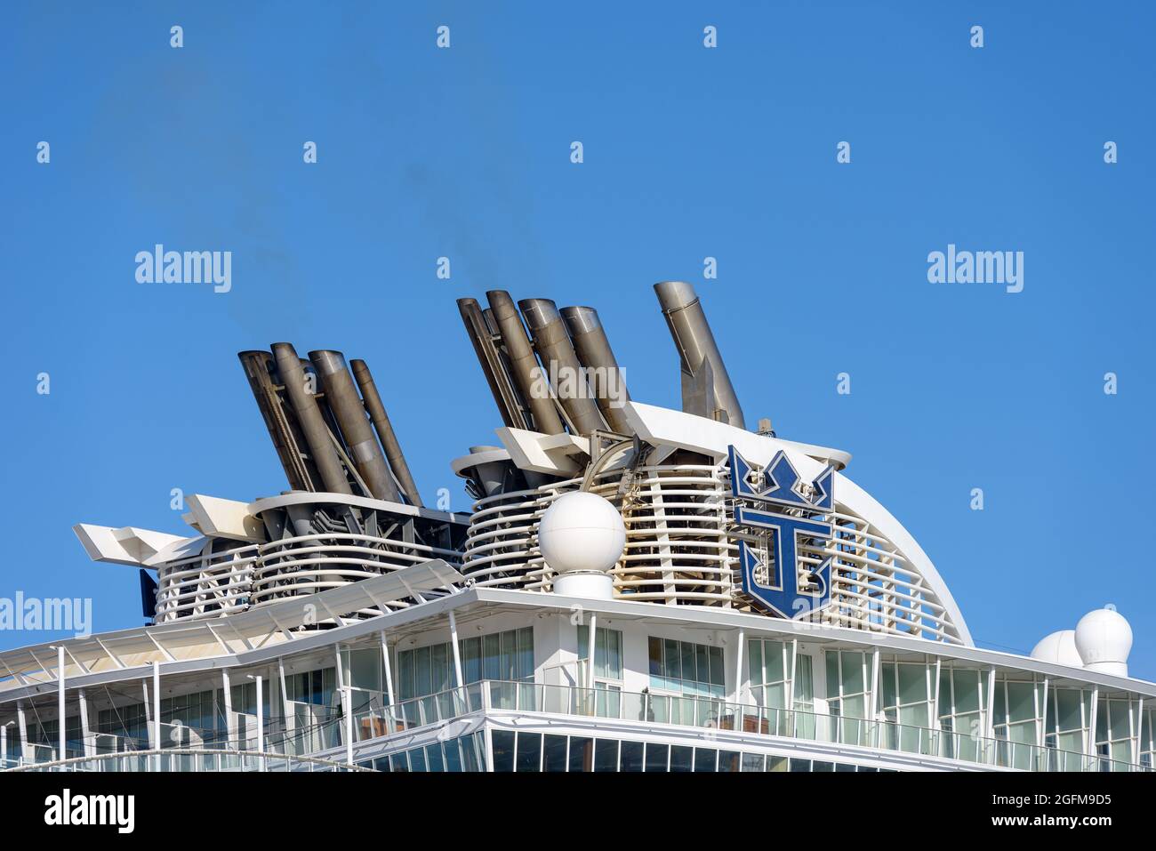 A view of the funnel logo of Allure of the Seas, operated by Royal ...