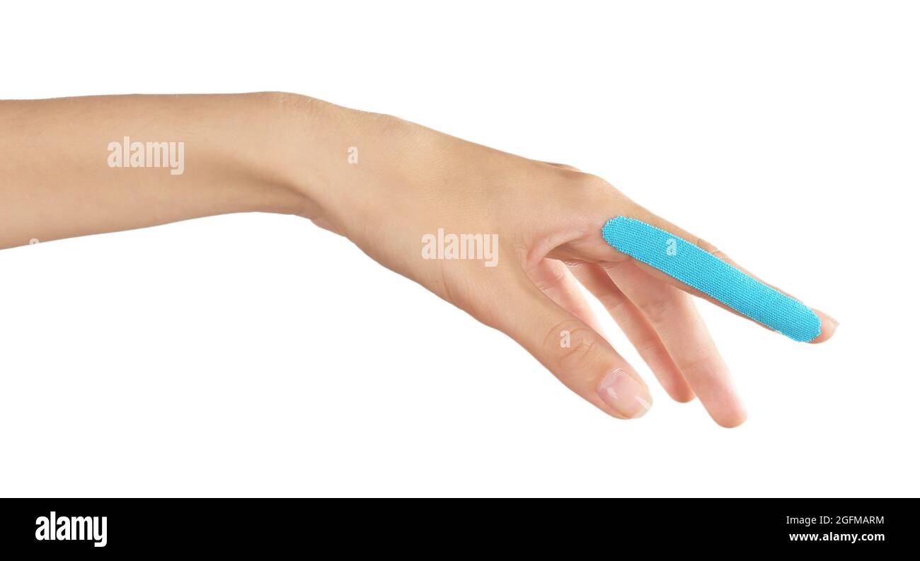 Physiotherapy concept. Female hand with physio tape on white background ...