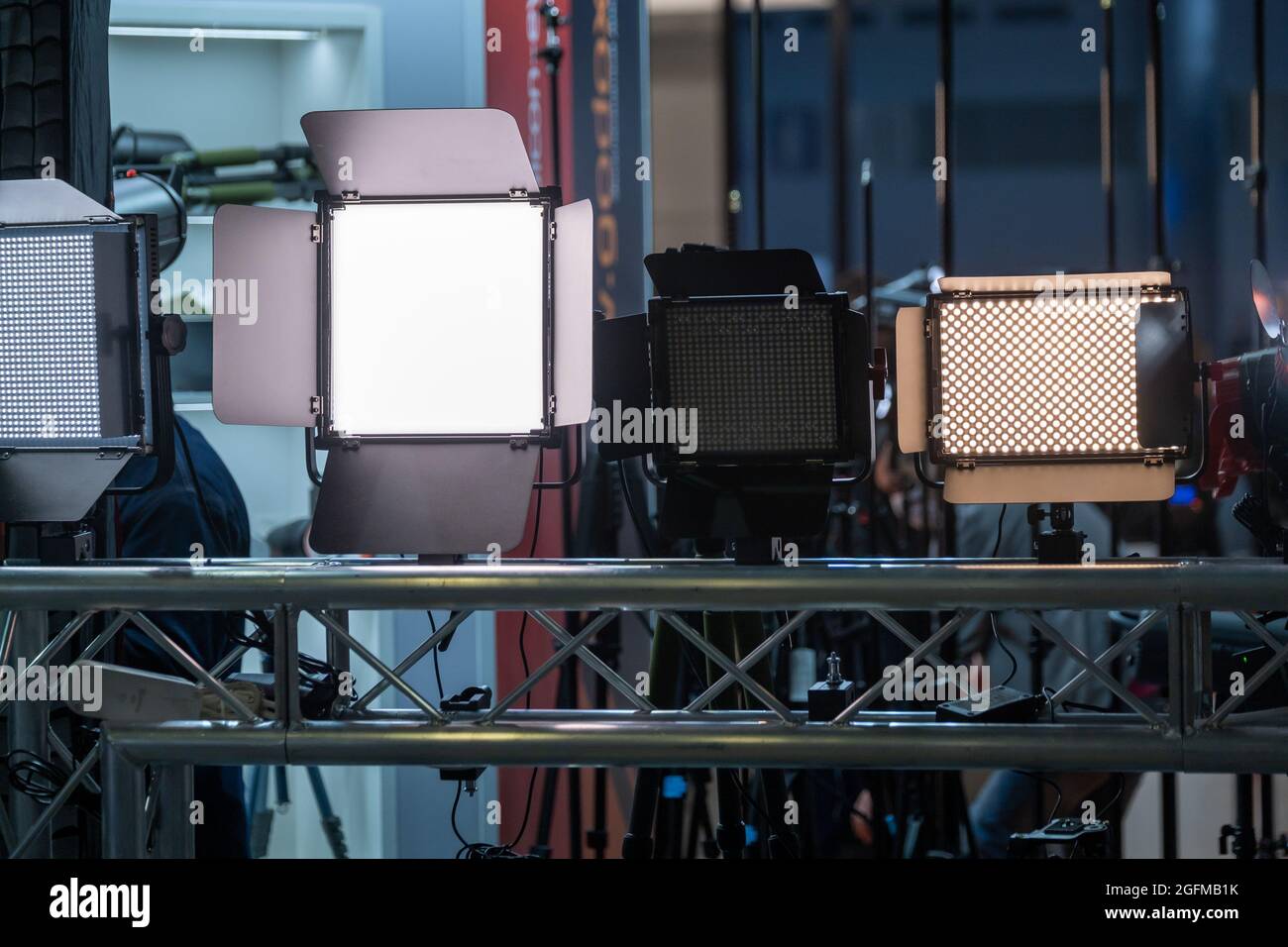 Modern spotlights on metal structure behind stage Stock Photo - Alamy