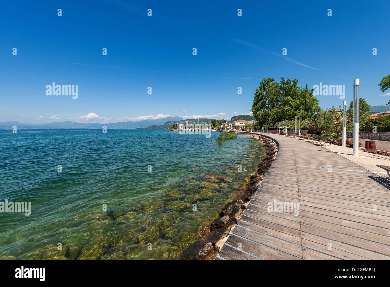Lakefront of the small Bardolino village with the port, tourist resort ...