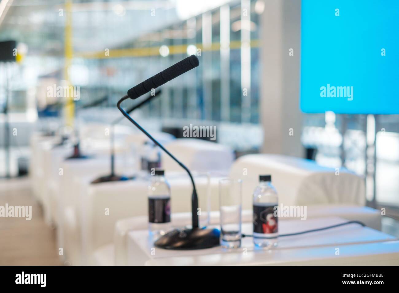 Table microphones at conference hall Stock Photo - Alamy