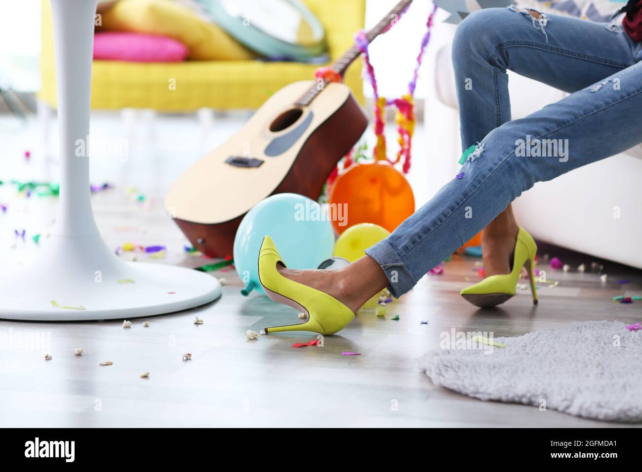 Tired woman after party at home Stock Photo - Alamy
