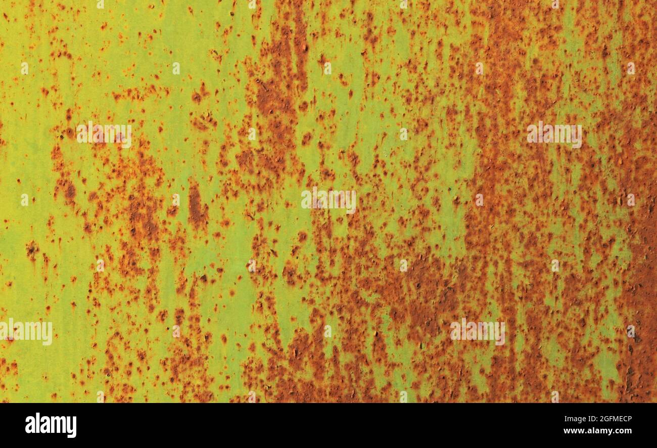 Metallic wall background, texture, colored in fiery yellow color. Old ...