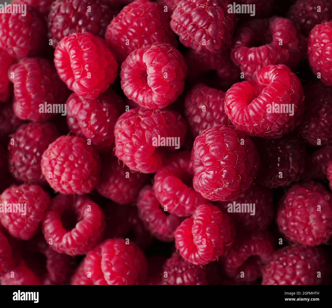 Fresh raspberries background Stock Photo - Alamy