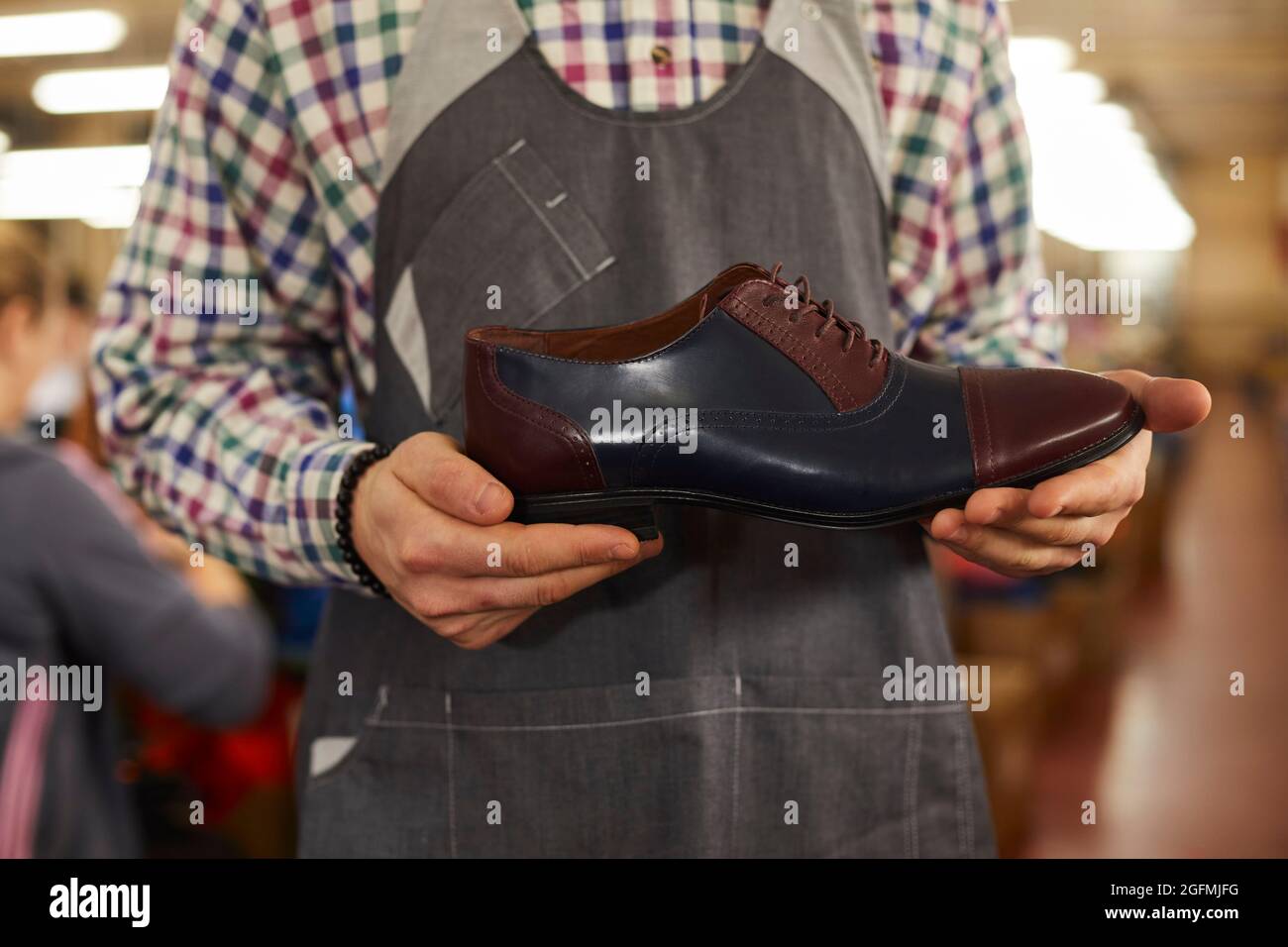 Hands holding boot hi-res stock photography and images - Alamy