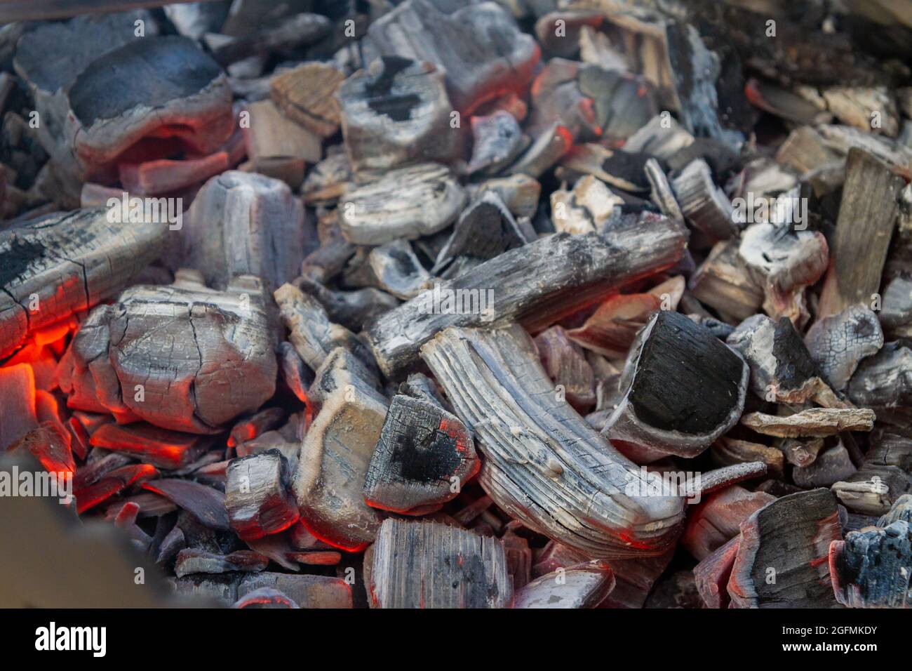 Red-hot coals lie in the barbecue grill in the spring Stock Photo - Alamy