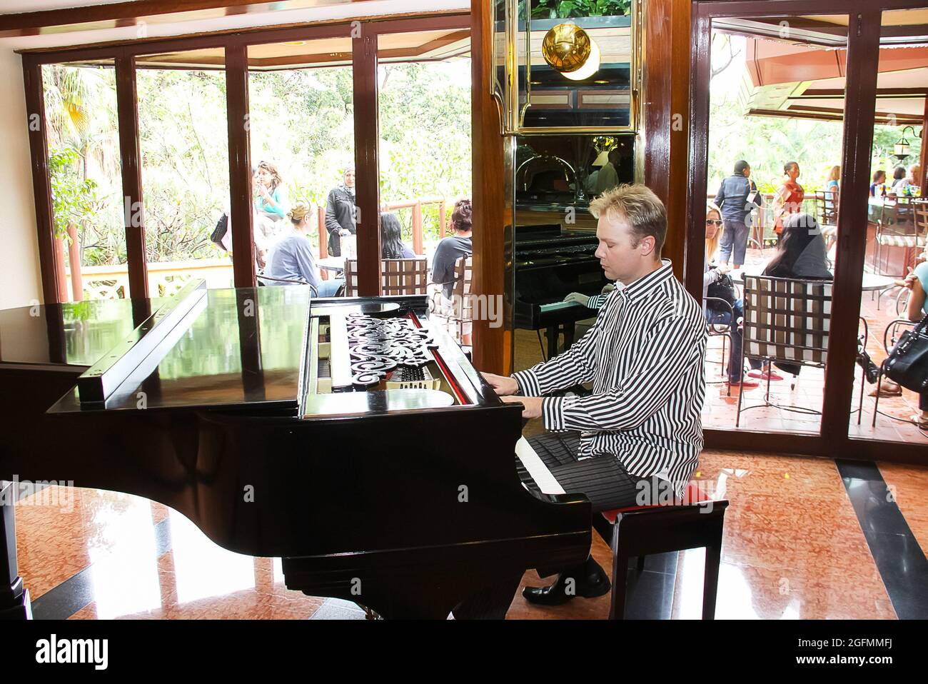 JOHANNESBURG, SOUTH AFRICA - Apr 24, 2019: classical piano player in ...