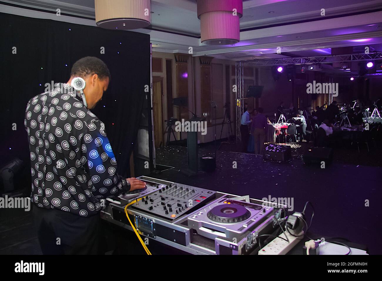 JOHANNESBURG, SOUTH AFRICA - May 03, 2019: Dj in a club playing music ...