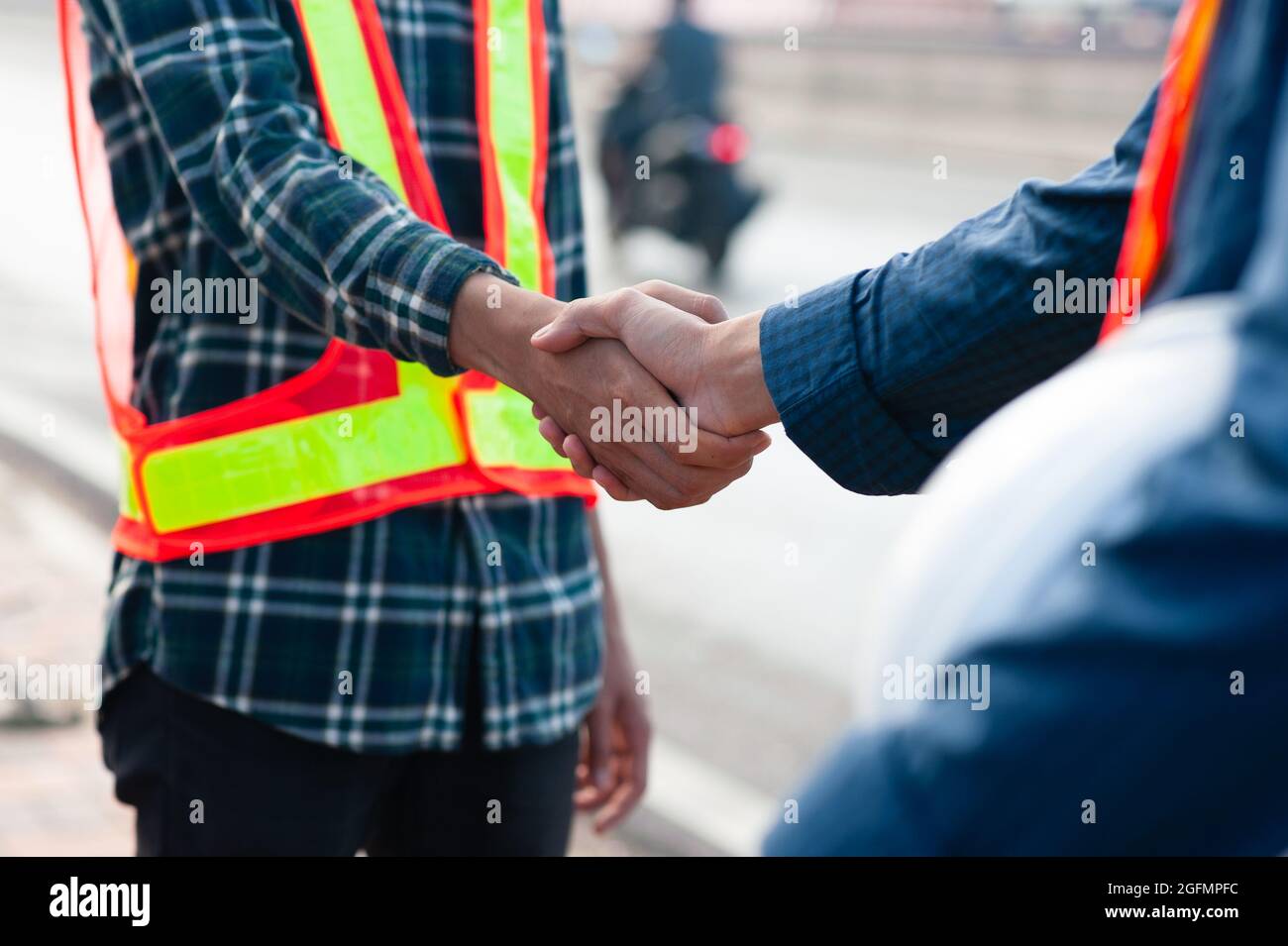 Closeup shake hand teamwork engineer on site work success , Hand shake ...