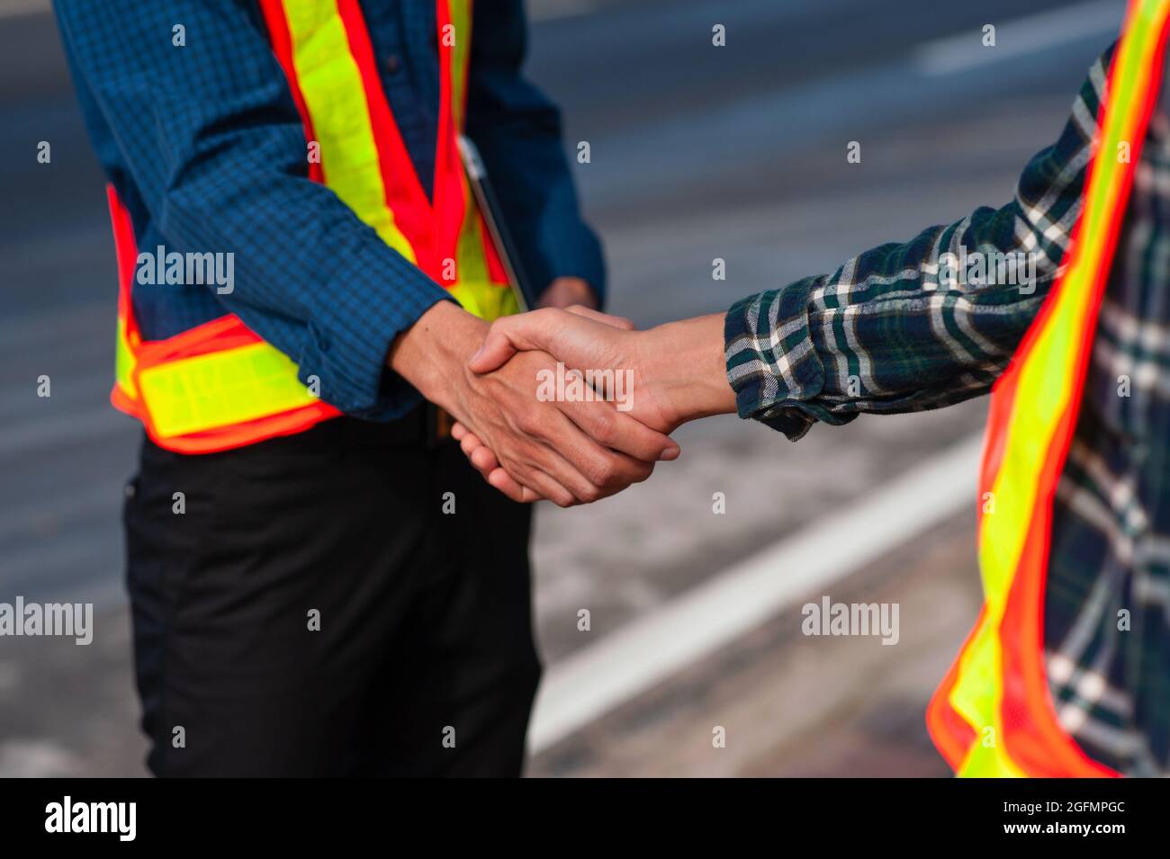 Closeup shake hand teamwork engineer on site work success , Hand shake ...