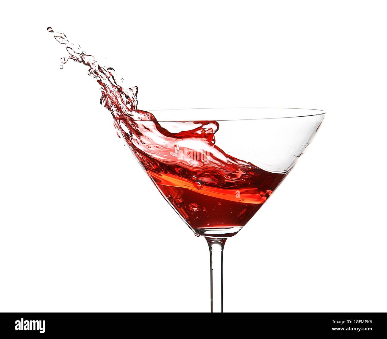 Red cocktail with splash on white background Stock Photo - Alamy