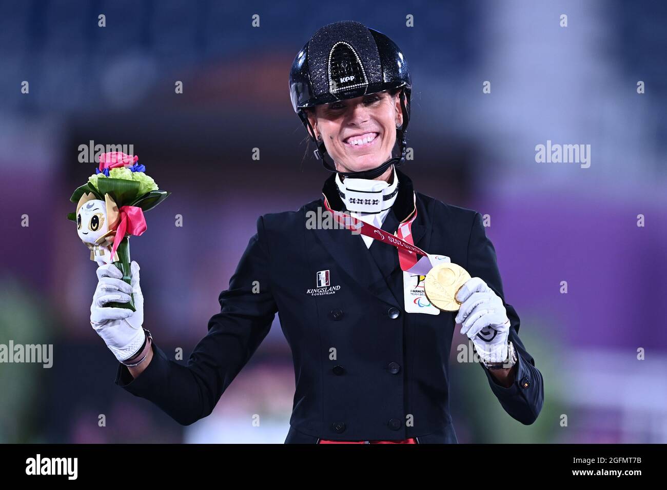 Belgian jockey Michele George , winner of the gold medal celebrates on ...