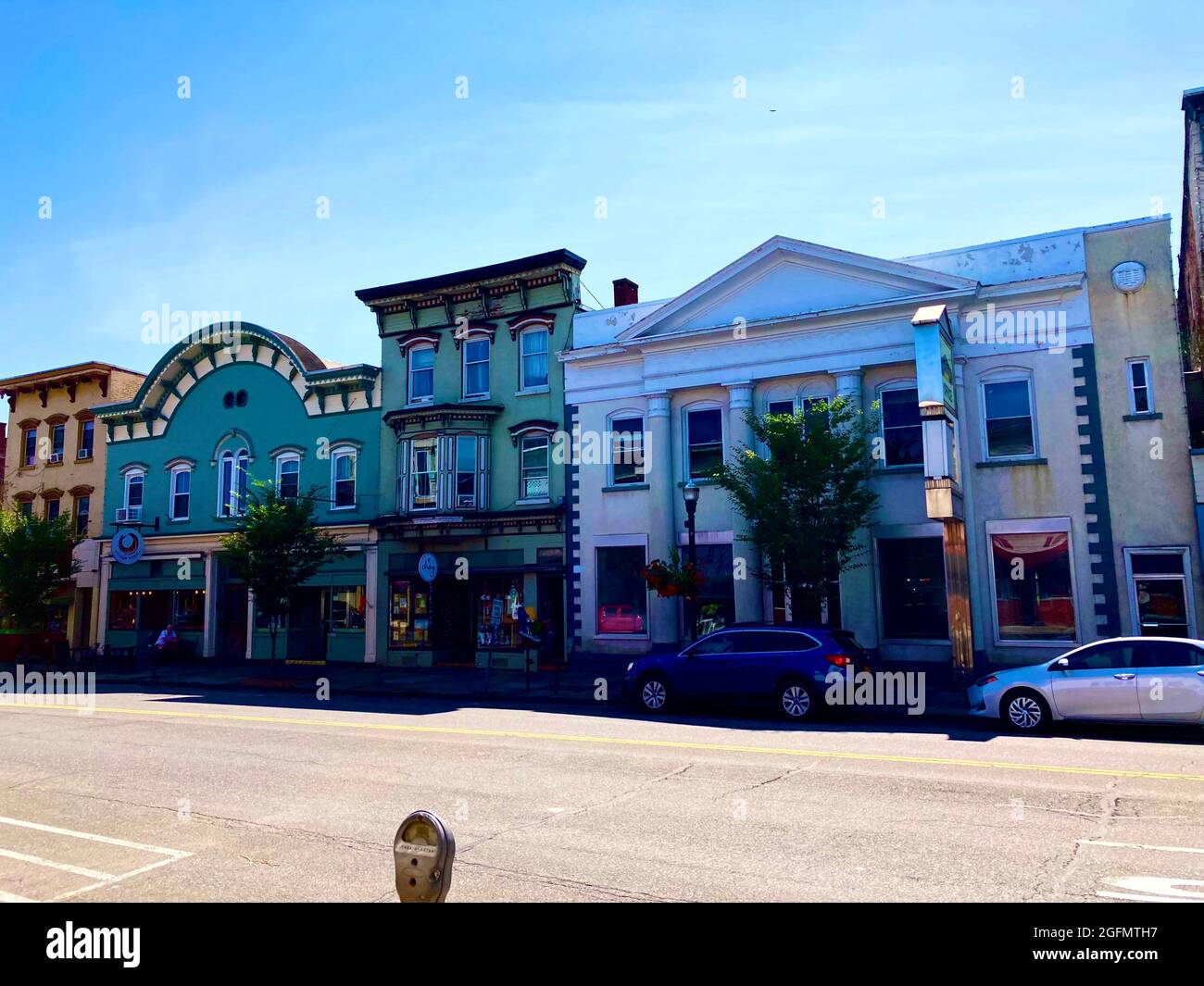 Victorian townhouses (left) with Greek Revival building (centre) on Partition Street in ...