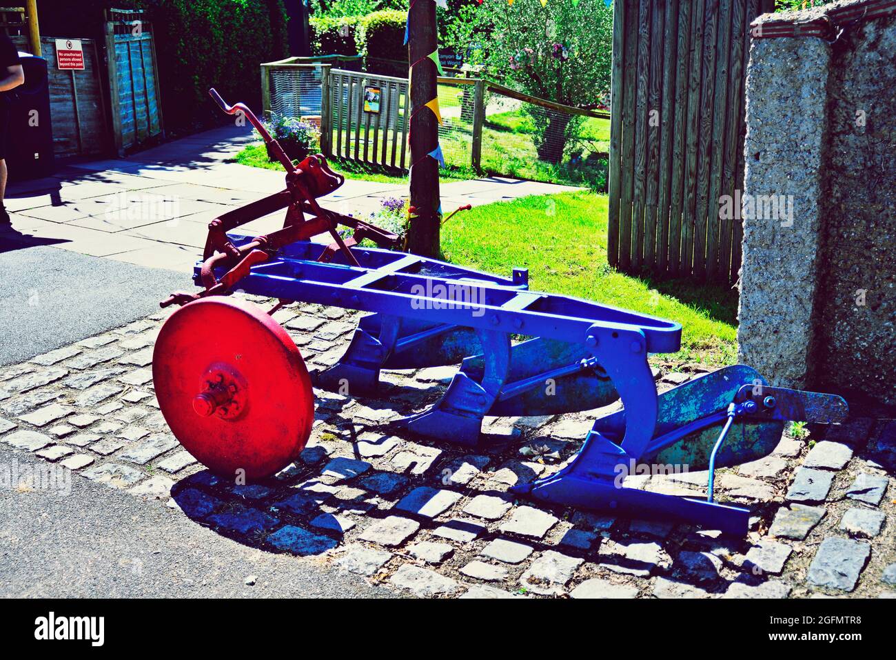 Refurbished farming equipment on display Stock Photo - Alamy