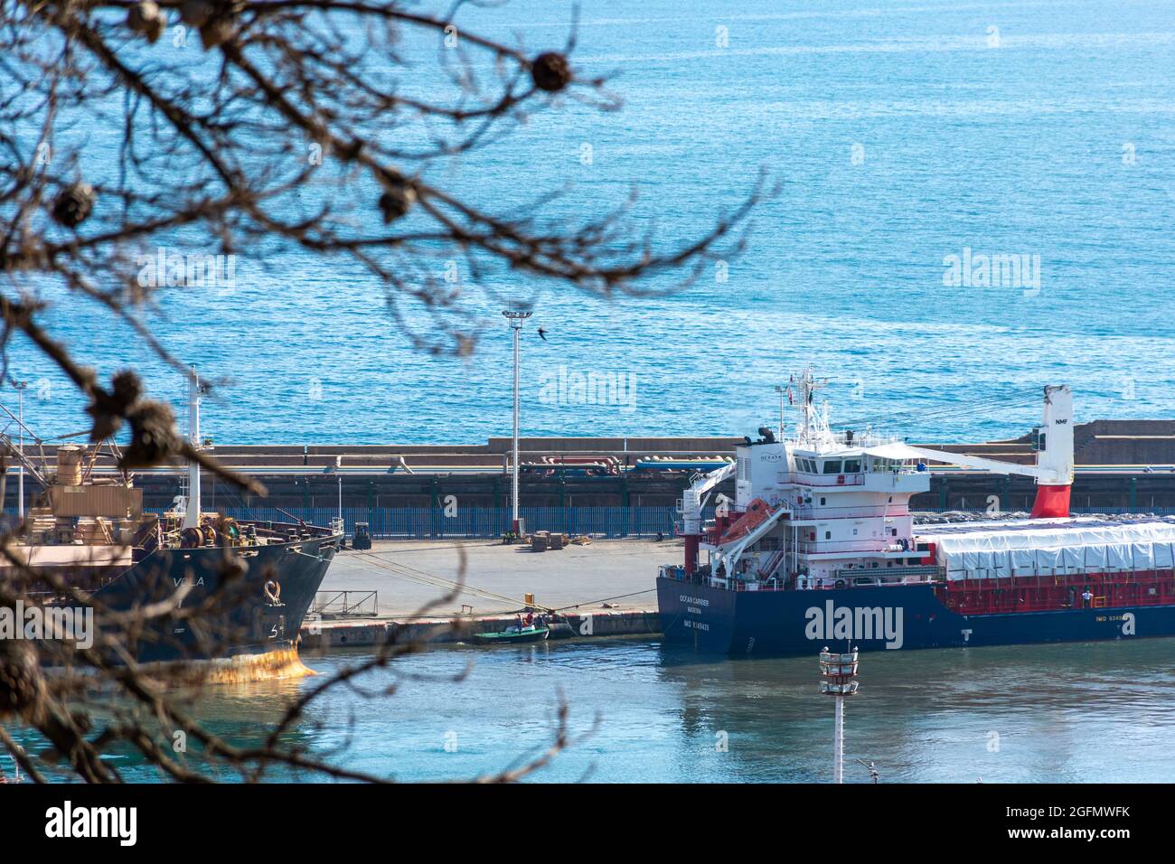 High-angle view of Skikda Port, shipping containers, oil tanker ship ...