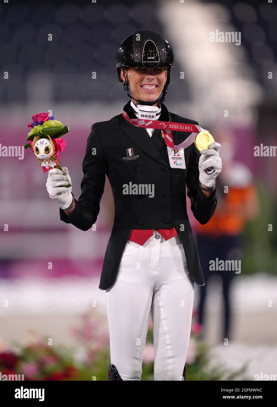 Belgium's Michele George celebrates winning gold in the Dressage ...