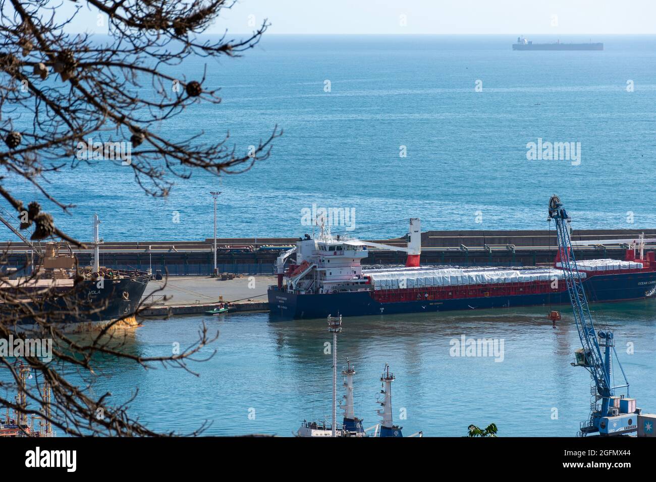 High-angle view of Skikda Port, shipping containers, oil tanker ship ...