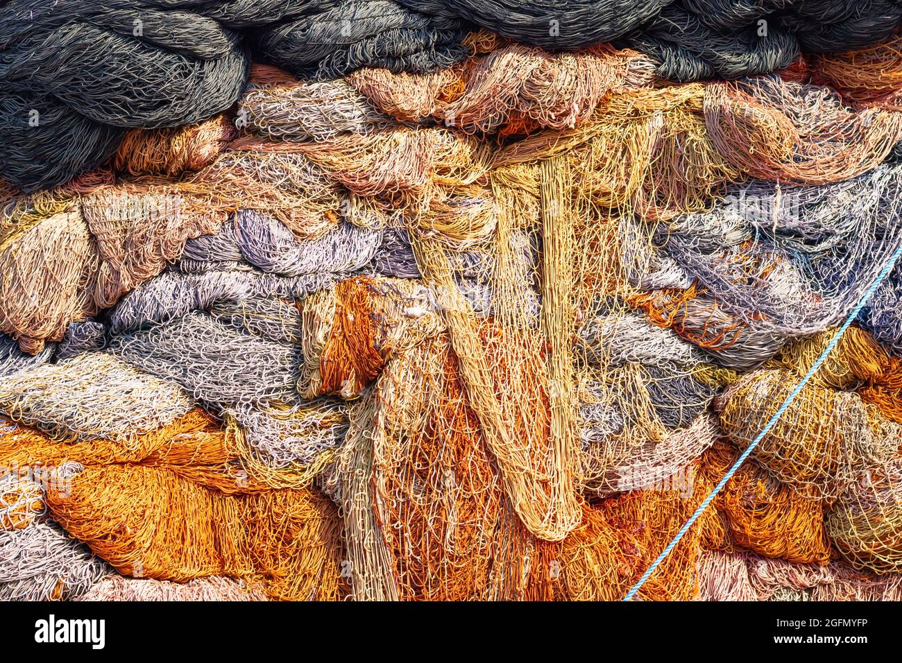 Fishing nets stack or heap in the fishing harbor Stock Photo - Alamy