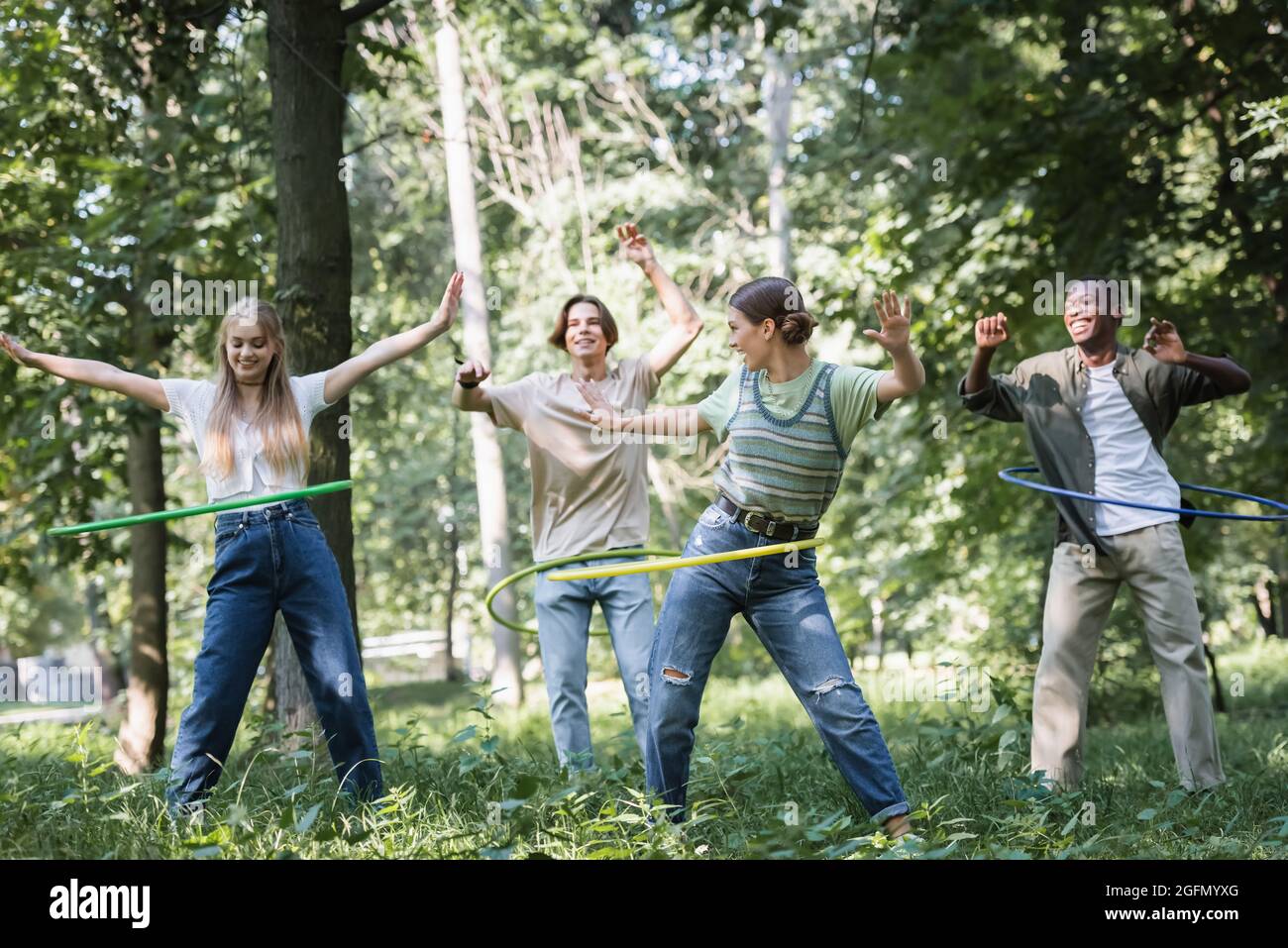 African american friends twisting hi-res stock photography and images ...