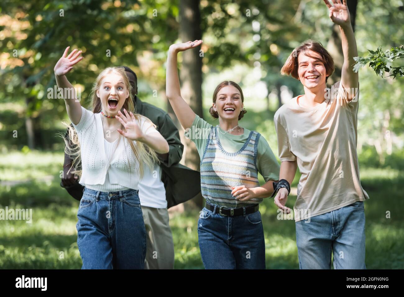 Teen girls waving hi-res stock photography and images - Alamy