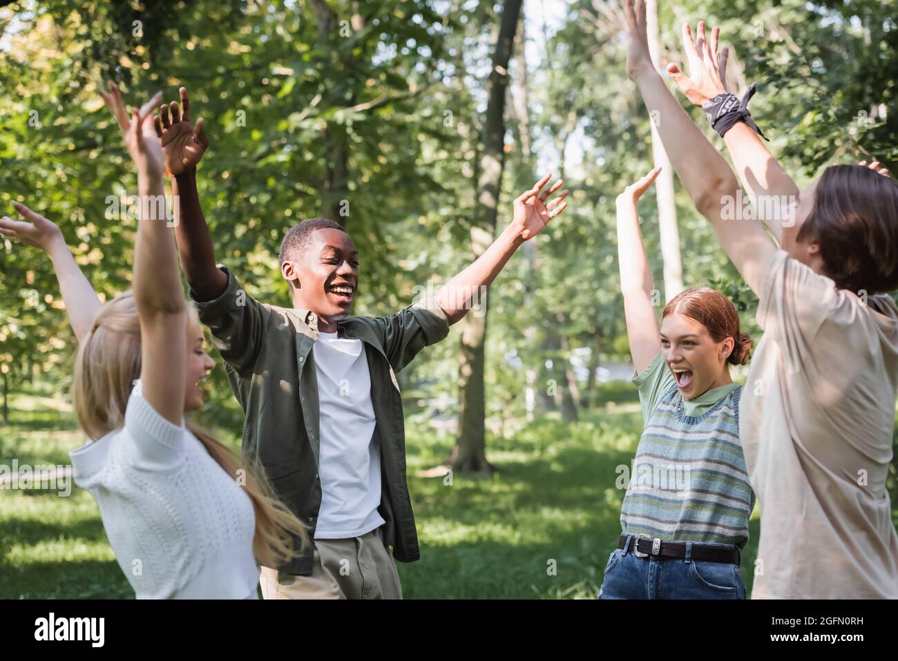 African american boy raising hands hi-res stock photography and images ...