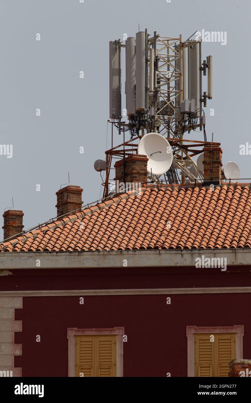 View of a home with mobile connection support tower in the roof in ...