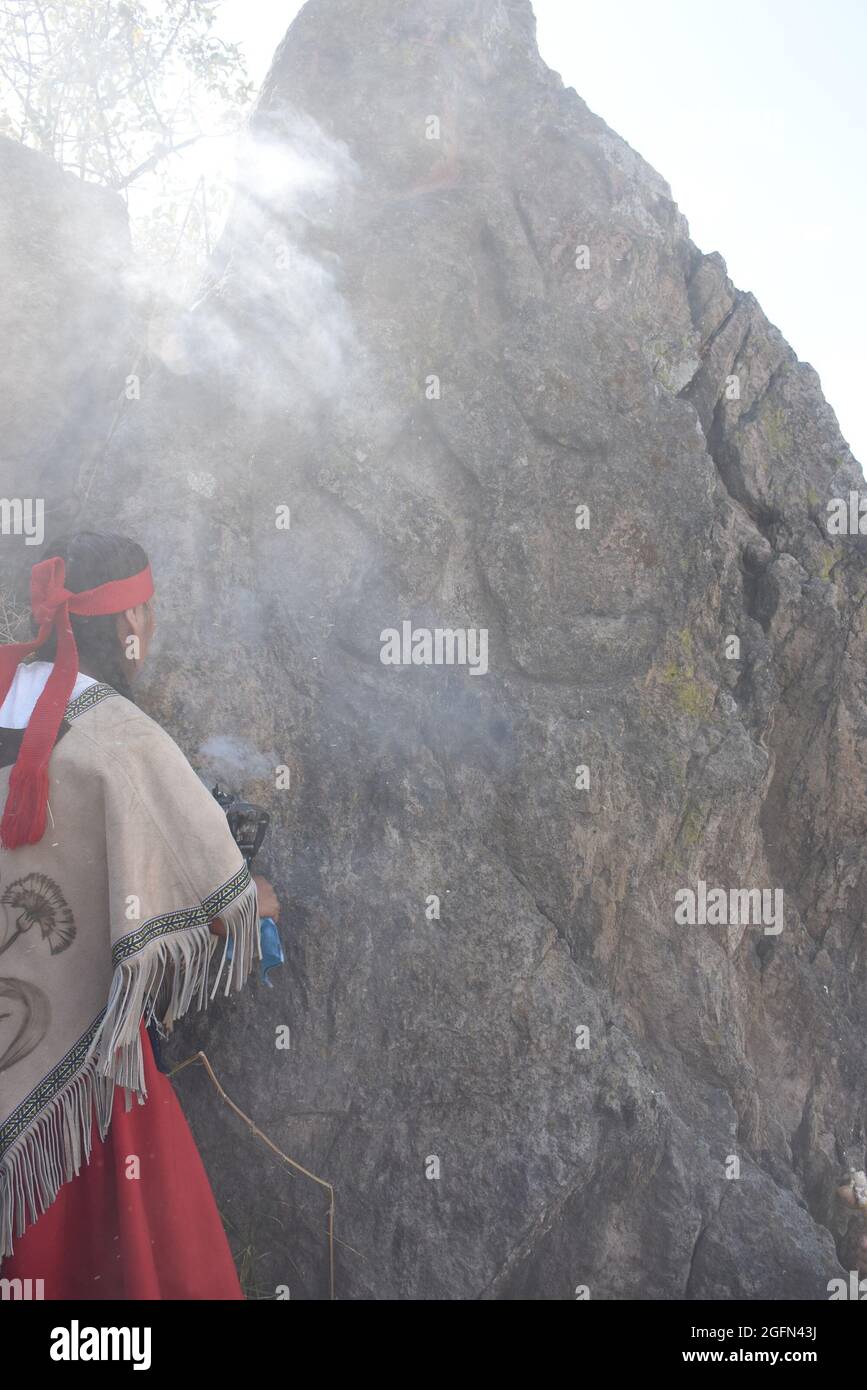 Curanderas—traditional healers or shamans—perform a ritual in front of ...